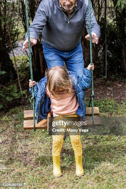 Grandfather Swing Backyard Photos And Premium High Res Pictures Getty
