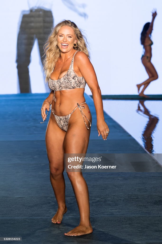 Kristen Louelle walks the runway during the 2021 Sports Illustrated ... Kristen Louelle walks the runway during the 2021 Sports Illustrated ...