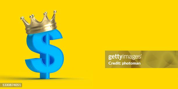 A golden crown on the US American money symbol, USD with large copy ...
