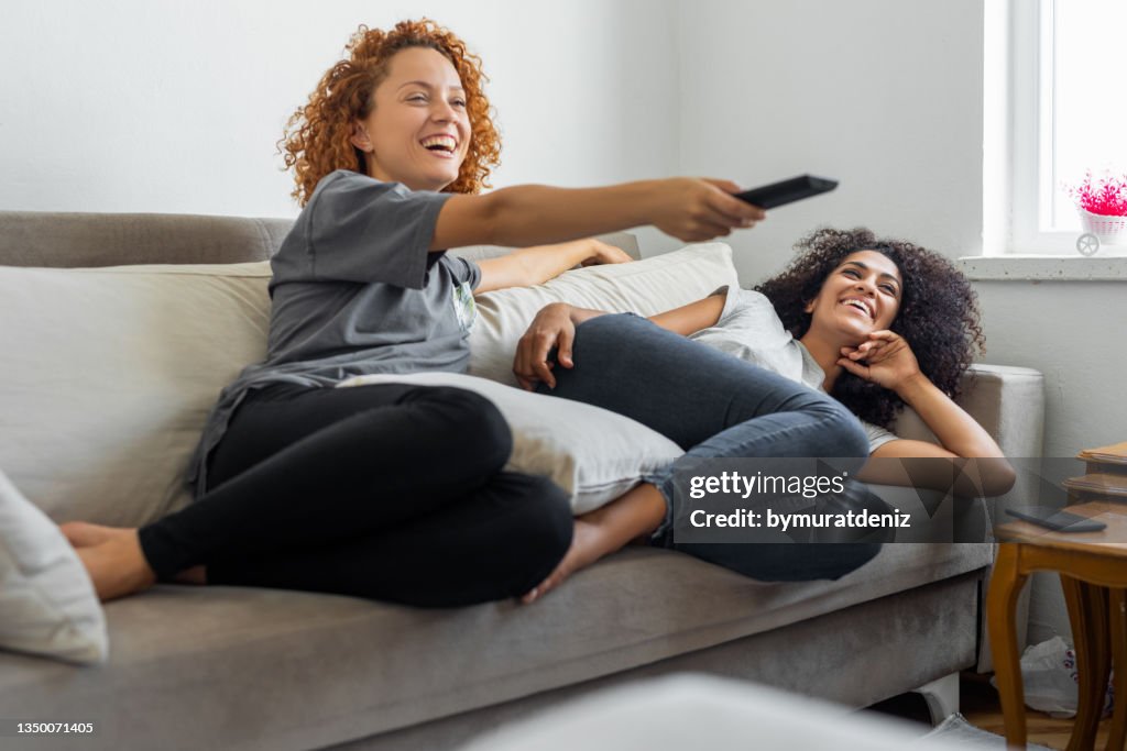 Girlfriends Are Watching Their Favorite Tv Show While Sitting On The