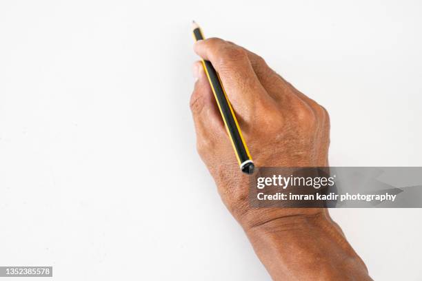 Arm Holding Pencil Photos and Premium High Res Pictures - Getty Images Arm Holding Pencil Photos and Premium High Res Pictures - Getty Images