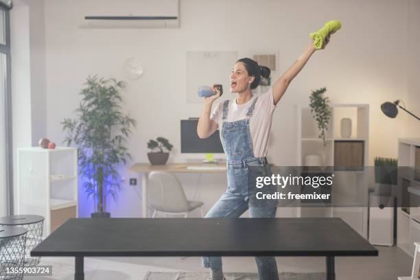 Cleaning And Dancing Photos And Premium High Res Pictures Getty Images