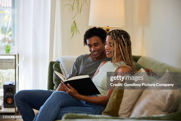 Black Couple Reading Book Photos And Premium High Res Pictures Getty