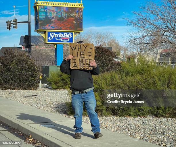 Panhandler Sign Photos and Premium High Res Pictures - Getty Images Panhandler Sign Photos and Premium High Res Pictures - Getty Images