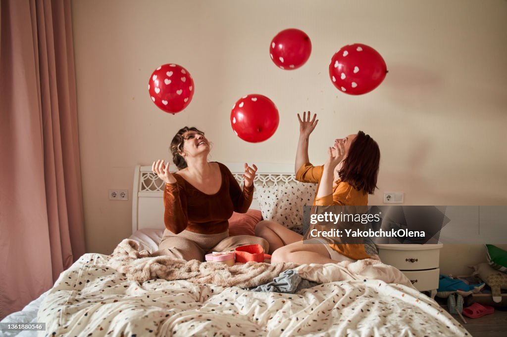 Two Lesbian Girls Celebrating Anniversary At Home While Throwing Up