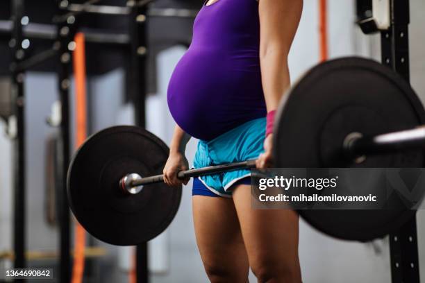 Pregnant Woman Lifting Weights Photos And Premium High Res Pictures Getty Images