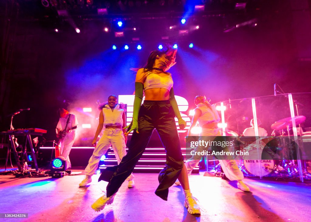 Singer-songwriter Tate McRae performs on stage during her North ... Singer-songwriter Tate McRae performs on stage during her North ...