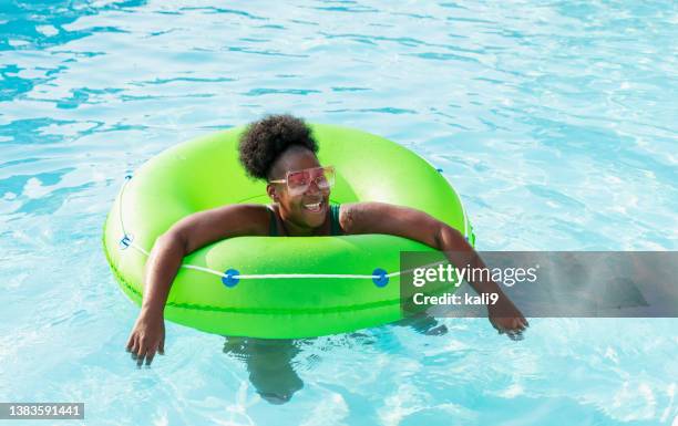 Older Woman Pool Float Photos And Premium High Res Pictures Getty Images