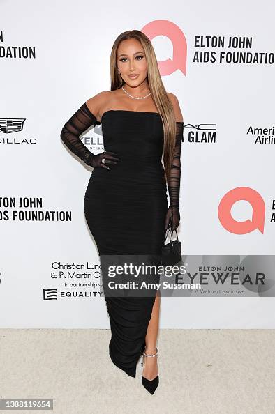 Adrienne Bailon attends the Elton John AIDS Foundation's 30th Annual ... Adrienne Bailon attends the Elton John AIDS Foundation's 30th Annual ...