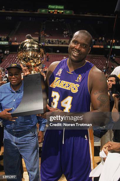 Shaquille Oneal Holding Photos And Premium High Res Pictures Getty Images