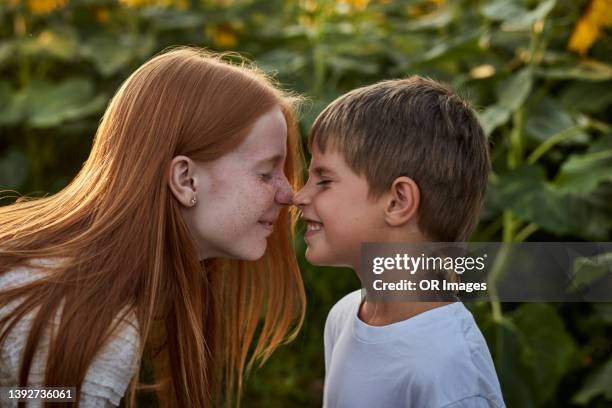 Two Girls Rubbing Each Other Stock Fotos Und Bilder Getty Images