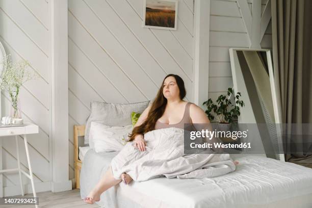 Woman With Blanket Sitting On Bed At Home High-Res Stock Photo - Getty ... Woman With Blanket Sitting On Bed At Home High-Res Stock Photo - Getty ...