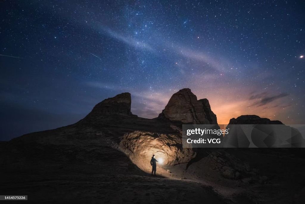 The Perseid meteor shower illuminate the night sky over the Eboliang ... The Perseid meteor shower illuminate the night sky over the Eboliang ...