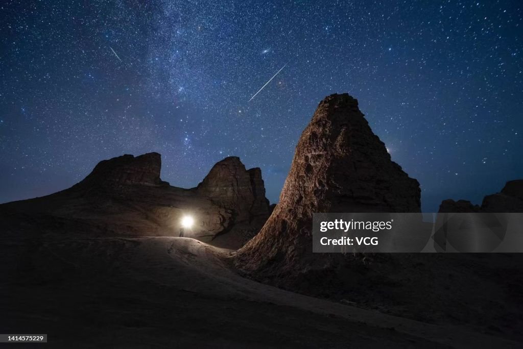 The Perseid meteor shower illuminate the night sky over the Eboliang ... The Perseid meteor shower illuminate the night sky over the Eboliang ...