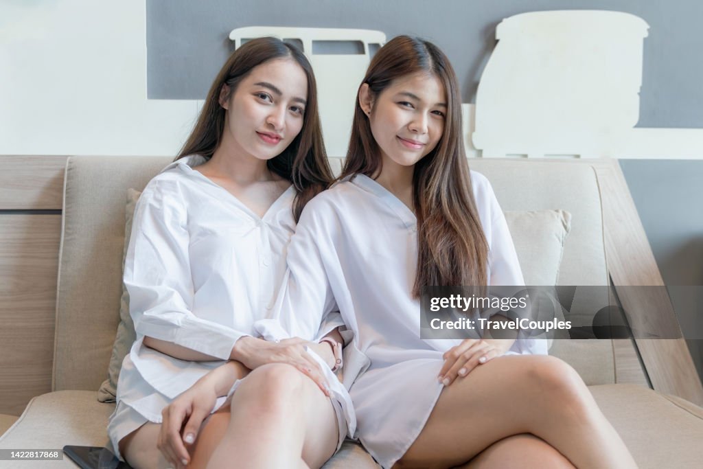 Beautiful Two Female Lgbt Lesbian Embracing And Looking Together With