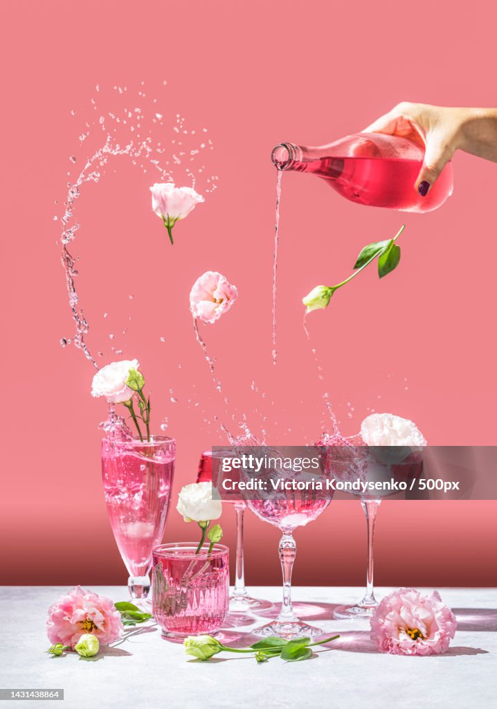 Different Elegant Champagne Glasses With Sparkling Winewomen Hand Is Pouring Rose Wine High Res