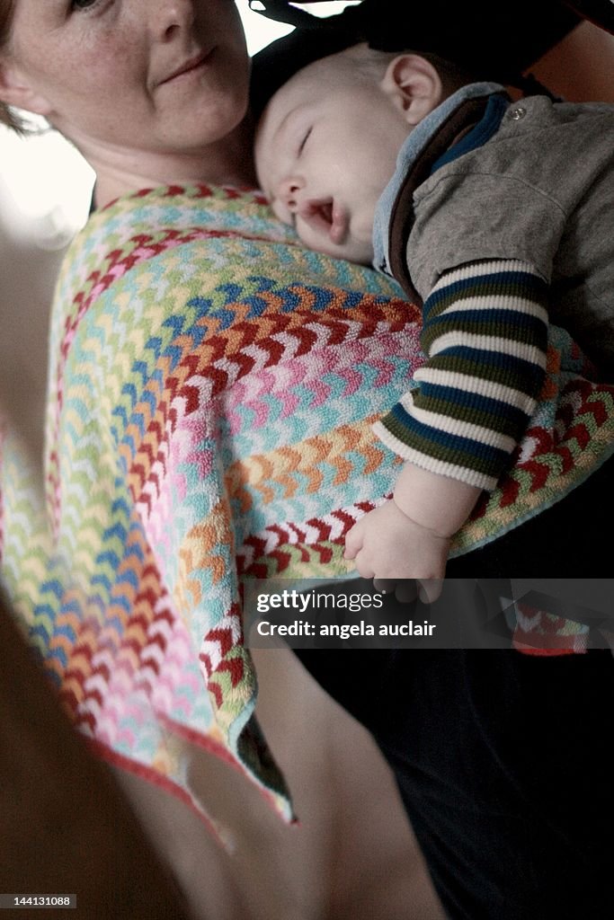 Mother Carrying Her Sleeping Child High-Res Stock Photo - Getty Images Mother Carrying Her Sleeping Child High-Res Stock Photo - Getty Images