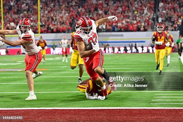 Thomas Yassmin Of The Utah Utes Scores A Touchdown During The Fourth