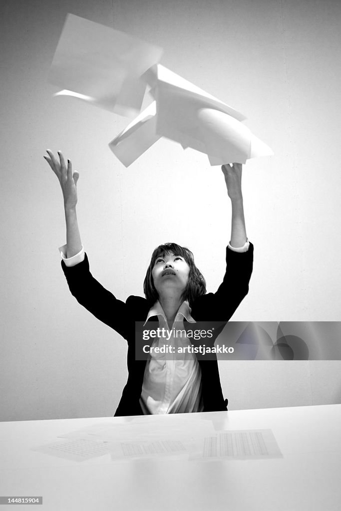 Business Woman Throwing Papers High-Res Stock Photo - Getty Images Business Woman Throwing Papers High-Res Stock Photo - Getty Images