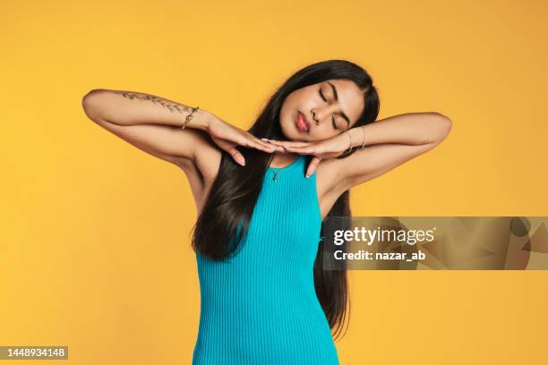 Woman Resting Chin Hand Photos And Premium High Res Pictures Getty Images