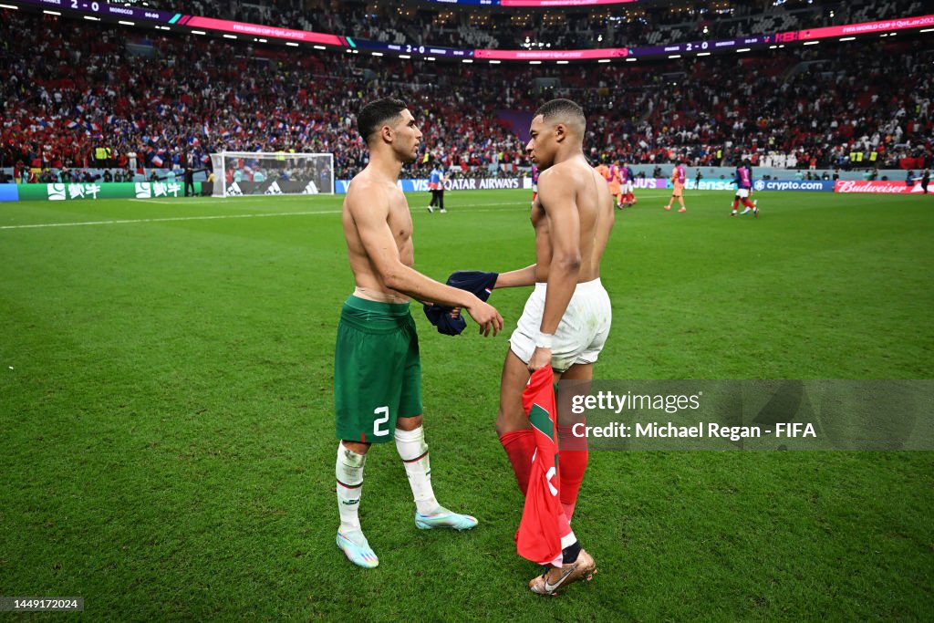 Achraf Hakimi Of Morocco Swaps Shirts With Kylian Mbappe Of France