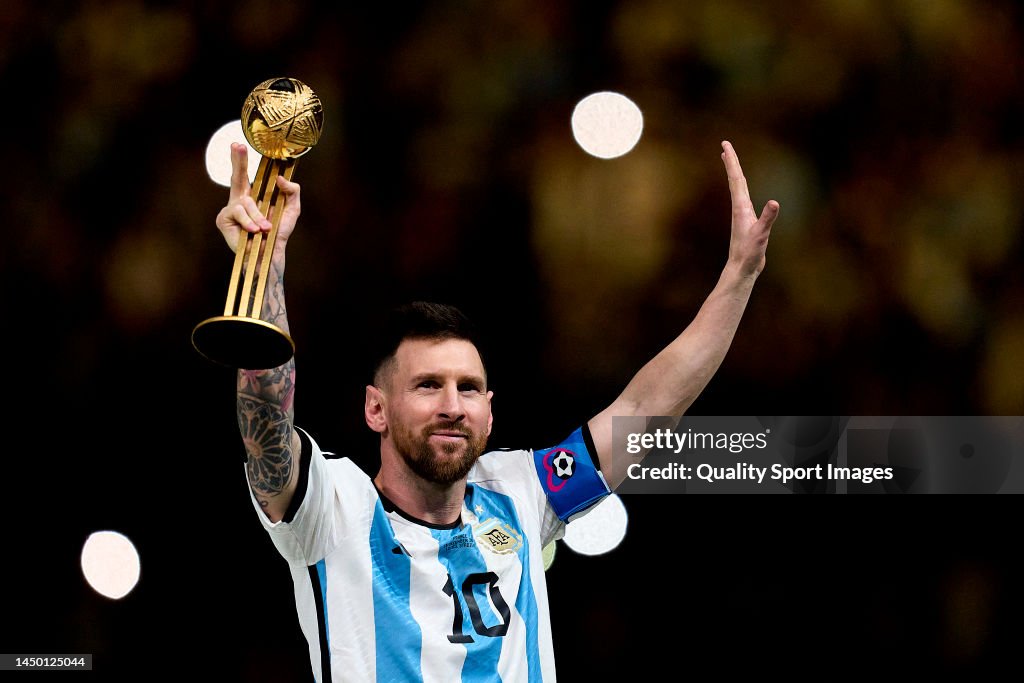 Lionel Messi Of Argentina Poses With The Golden Ball Award At The