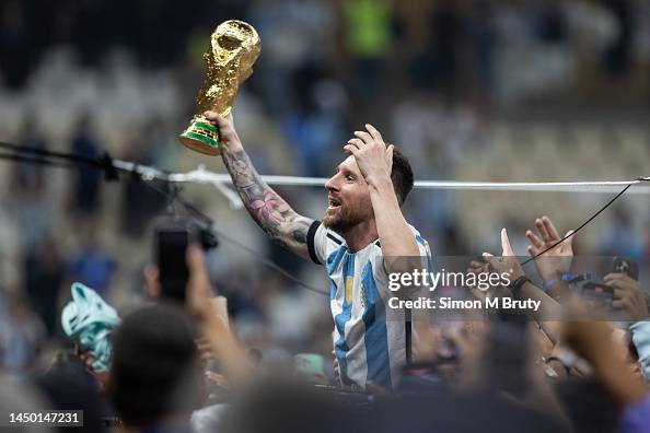 Lionel Messi Of Argentina Lifts The Fifa World Cup Trophy As He