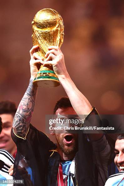 Lionel Messi Of Argentina Lifts The Fifa World Cup Trophy During The