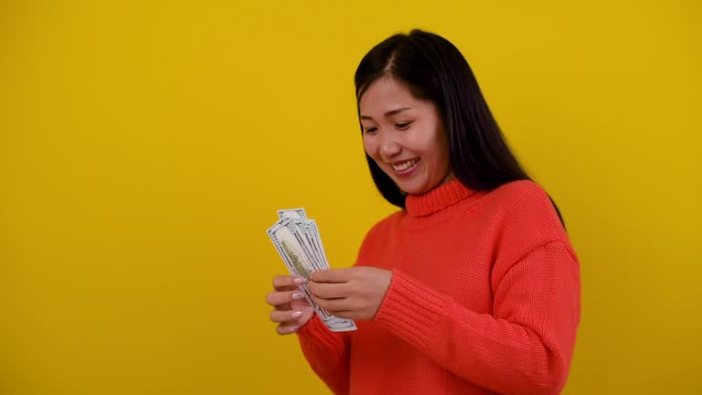 Young Woman Counting Money Videos And Hd Footage Getty Images