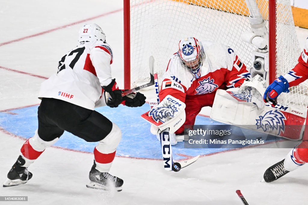 Goaltender Tomas Suchanek of Team Czech Republic pokes the puck away ... Goaltender Tomas Suchanek of Team Czech Republic pokes the puck away ...