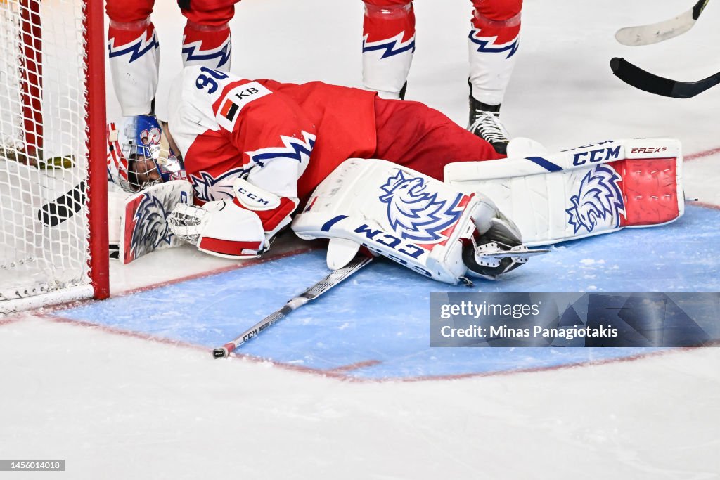 Goaltender Tomas Suchanek of Team Czech Republic lays on the ice hurt ... Goaltender Tomas Suchanek of Team Czech Republic lays on the ice hurt ...