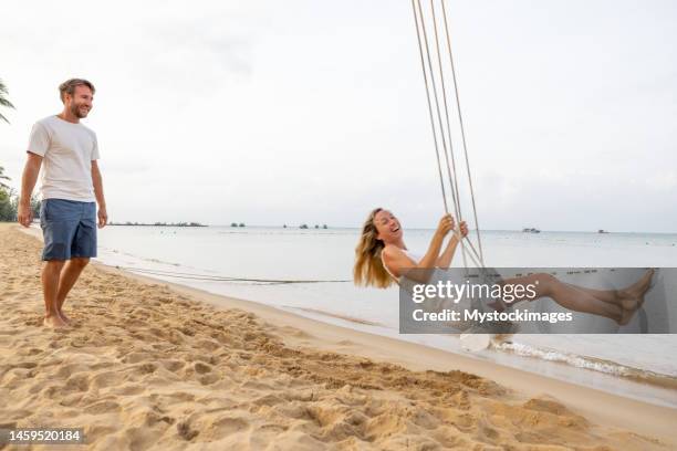 Couple Swinging On Swing Photos And Premium High Res Pictures Getty