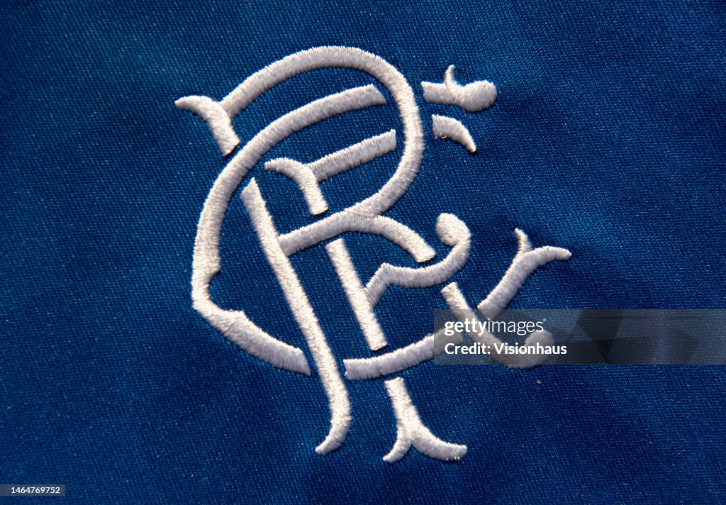 The Official Glasgow Rangers Fc Club Badge On A Home Shirt On News