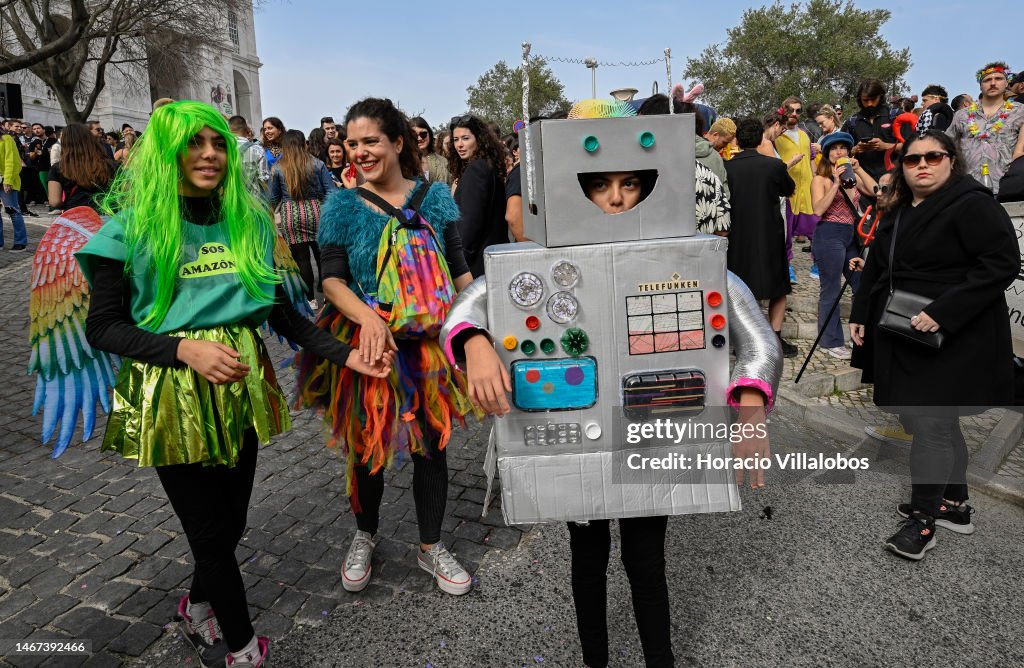 Revelers dress in costume during Revelers dress in costume during