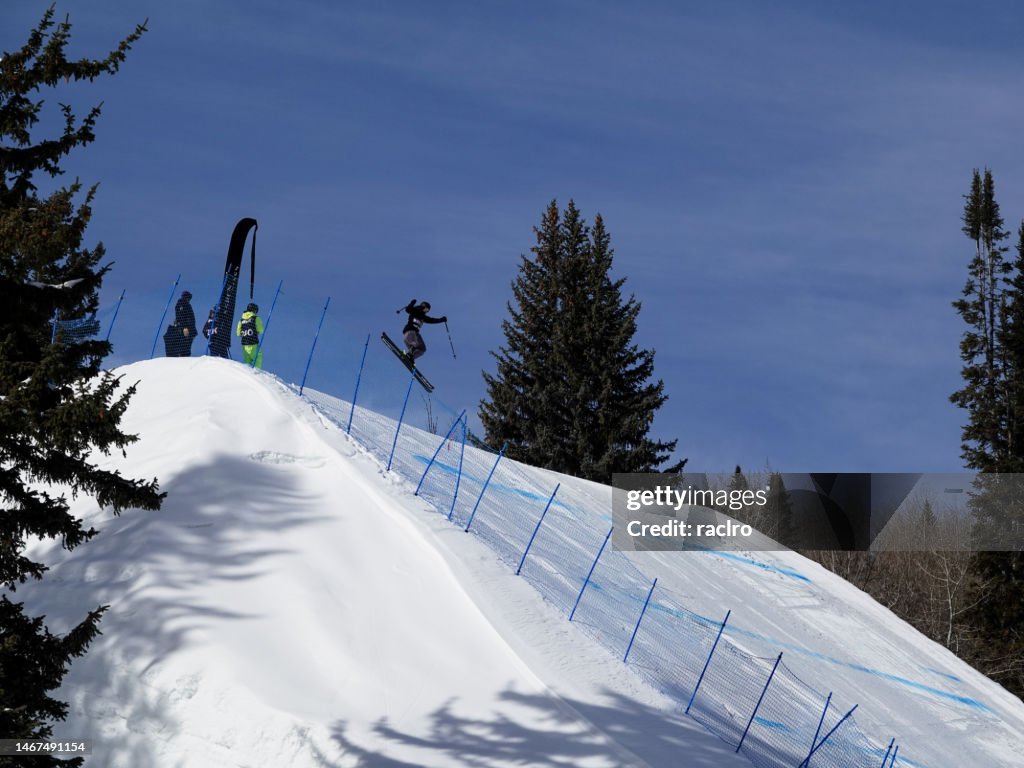 Skier Getting Big Air On A Jump At Buttermilk Ski Resort Aspen Colorado