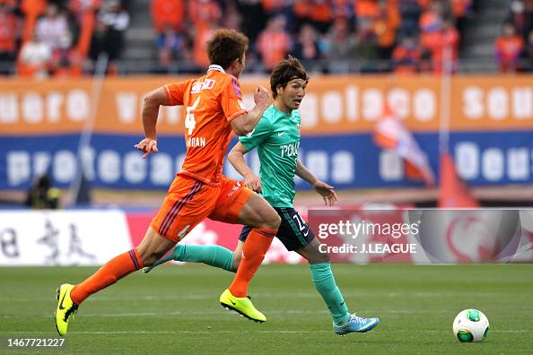 Genki Haraguchi Of Urawa Red Diamonds Controls The Ball Against Kim
