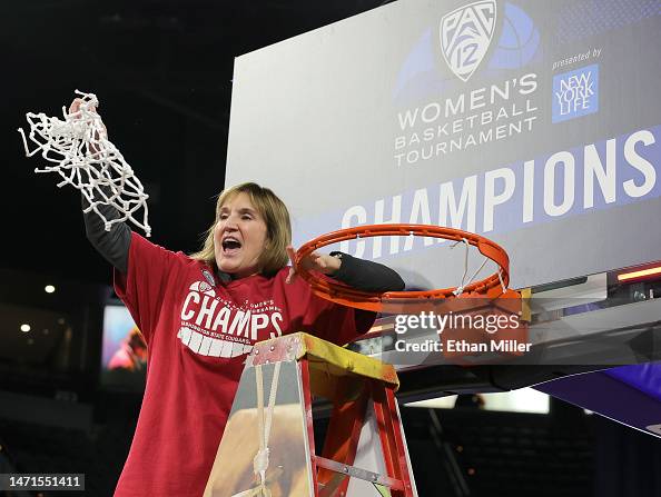 Head Coach Kamie Ethridge Of The Washington State Cougars Cuts Down A