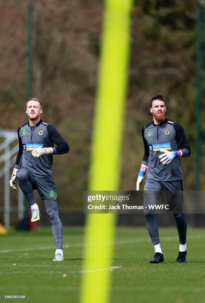 Dan Bentley And Jose Sa Of Wolverhampton Wanderers Warm Up During A