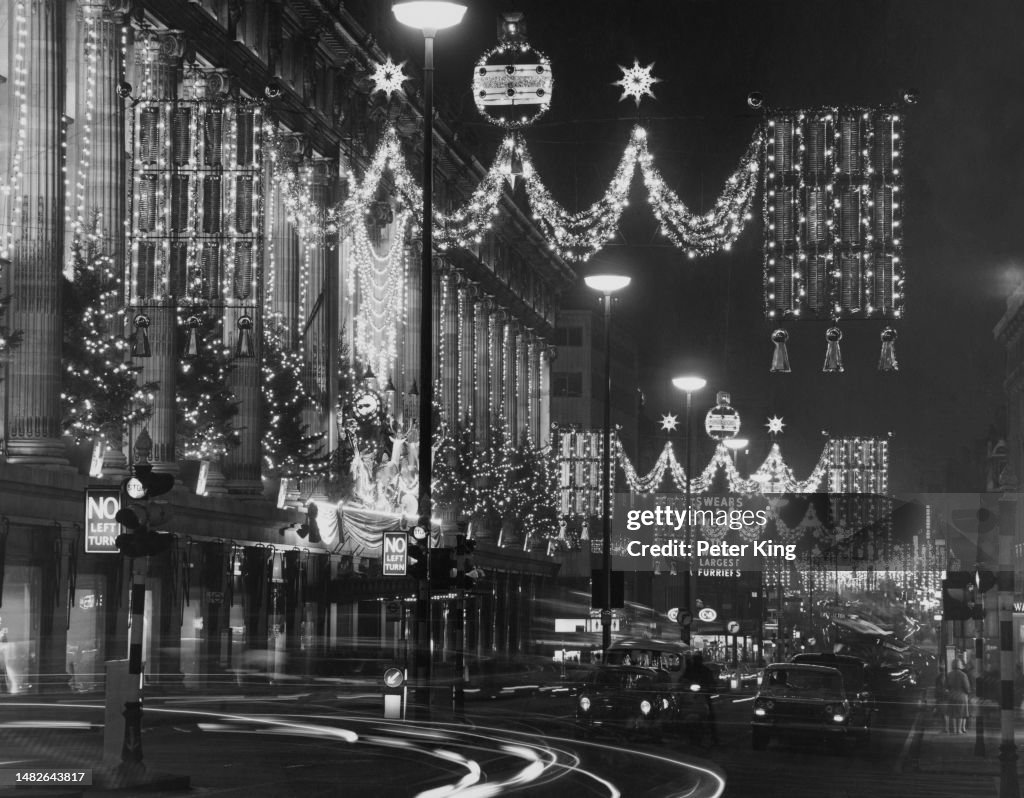 The Christmas lights above Oxford Street, with Selfridges department ... The Christmas lights above Oxford Street, with Selfridges department ...