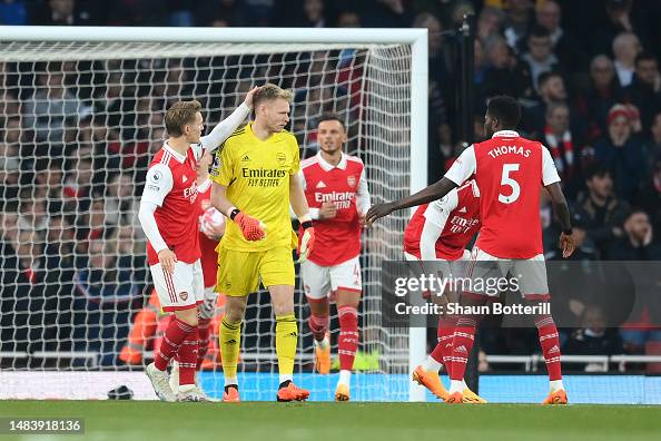 Martin Odegaard of Arsenal interacts with Aaron Ramsdale of Arsenal ... Martin Odegaard of Arsenal interacts with Aaron Ramsdale of Arsenal ...