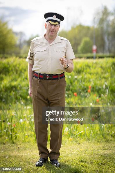 Garrison Sergeant Major Andrew Stokes poses for a portrait after a ... Garrison Sergeant Major Andrew Stokes poses for a portrait after a ...