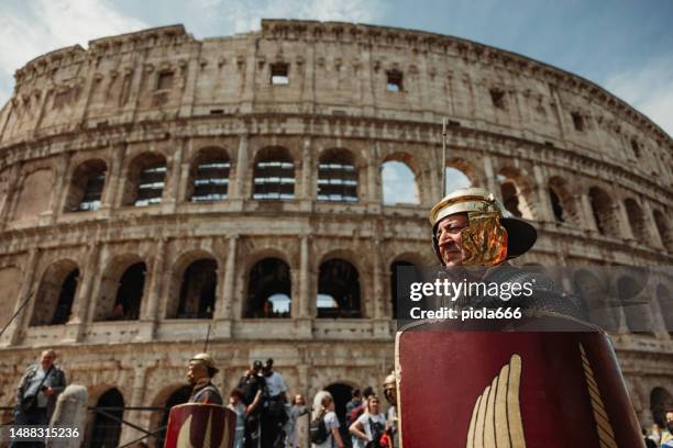 Gladiators parade under the Coliseum of Rome (1488315236) - 게티이미지뱅크