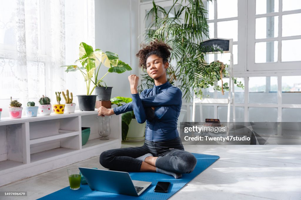 Young Black Pregnant Woman Stretching Arms Exercising At Home High Res