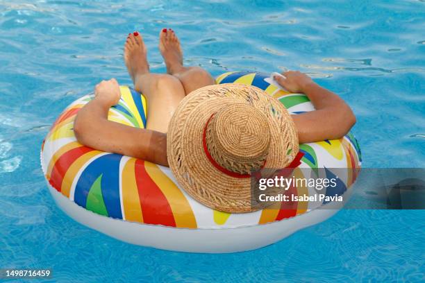 Mature Woman Pool Float Photos And Premium High Res Pictures Getty Images