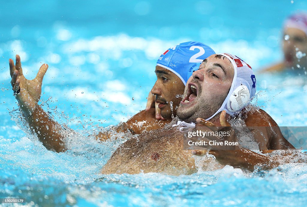 Niksa Dobud of Croatia and Amaurys Perez of Italy tussle in the Men's ... Niksa Dobud of Croatia and Amaurys Perez of Italy tussle in the Men's ...