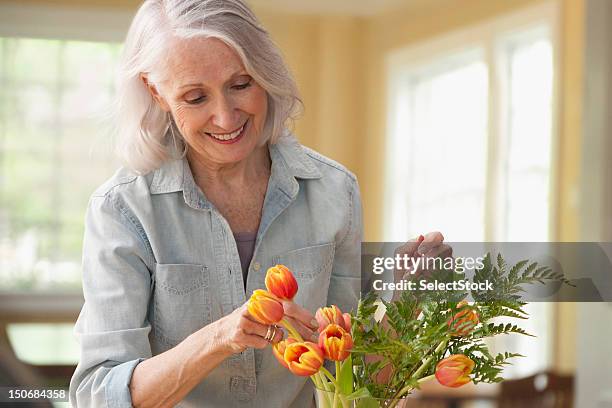 Seniors Arranging Flowers Photos And Premium High Res Pictures Getty