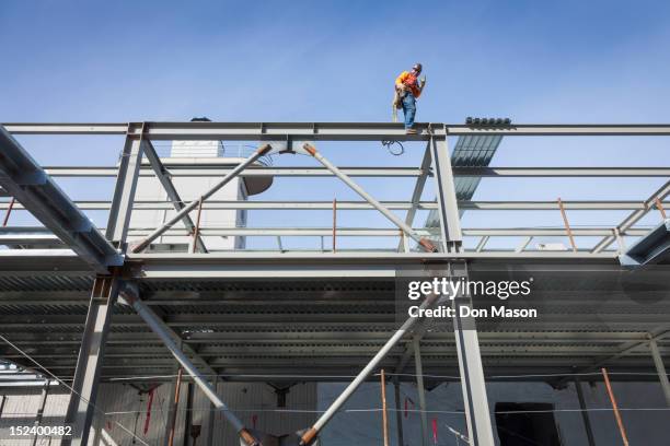 Caucasian Construction Worker Standing On Girder High-Res Stock Photo ... Caucasian Construction Worker Standing On Girder High-Res Stock Photo ...