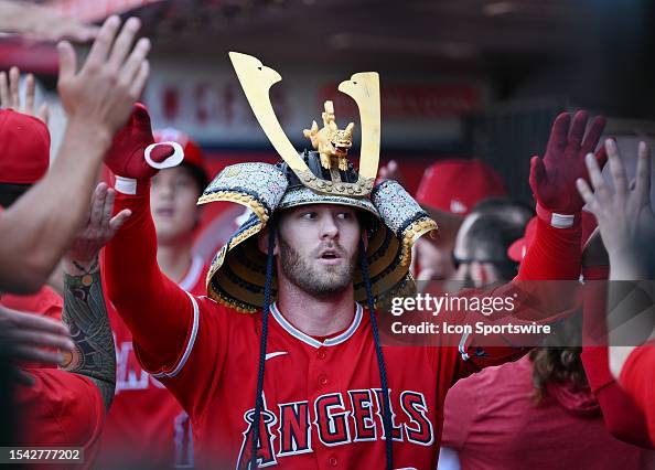 Los Angeles Angels left fielder Taylor Ward in the dugout wearing a ... Los Angeles Angels left fielder Taylor Ward in the dugout wearing a ...