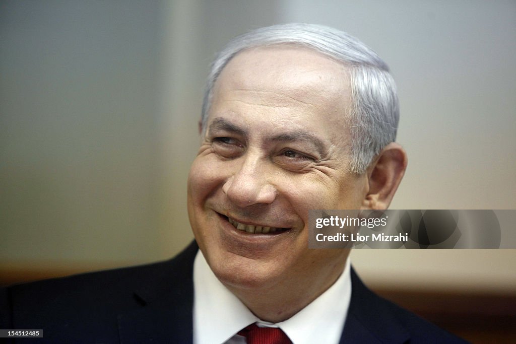 Israeli Prime Minister Benjamin Netanyahu smiles during a weekly ... Israeli Prime Minister Benjamin Netanyahu smiles during a weekly ...