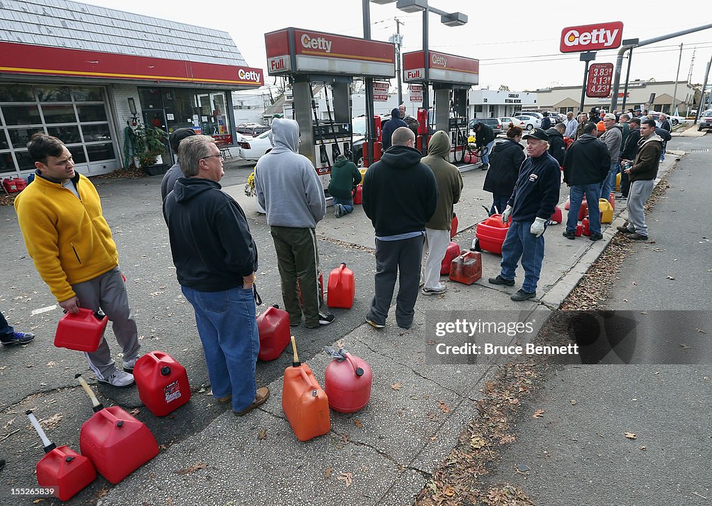 In The Aftermath Of Superstorm Sandy Patrons Wait In Line To Get